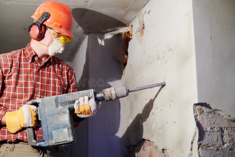 Worker with Demolition Hammer Breaking Interior Wall Stock Image ...