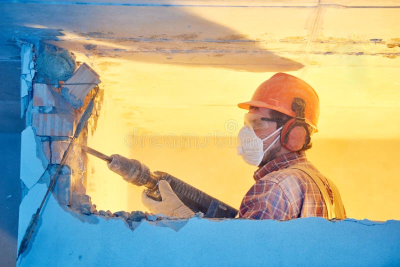 Worker with Demolition Hammer Breaking Interior Wall Stock Image ...