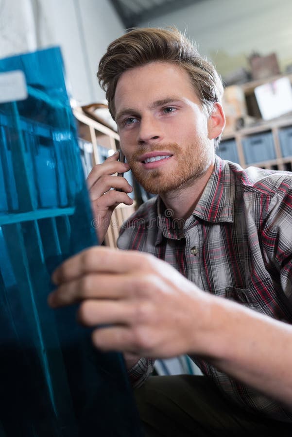 Worker on phone stock photo. Image of component, cellular - 197179372