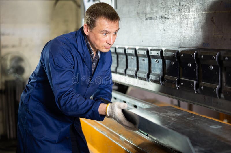 1,350 Man Bending Metal Stock Photos - Free & Royalty-Free Stock Photos ...