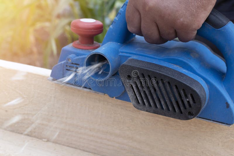 Worker is planing boards stock photo. Image of caucasian - 343132316