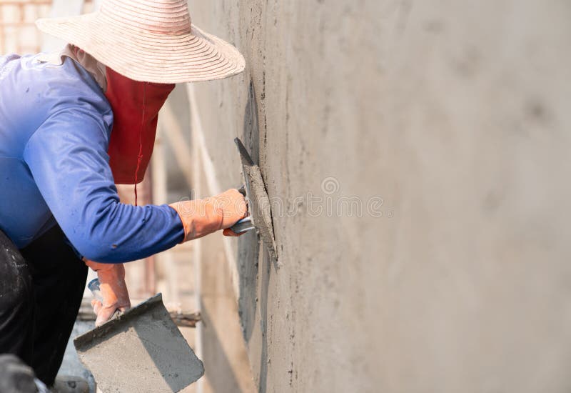 Worker Plastering Cement on Wall Stock Image - Image of concrete ...