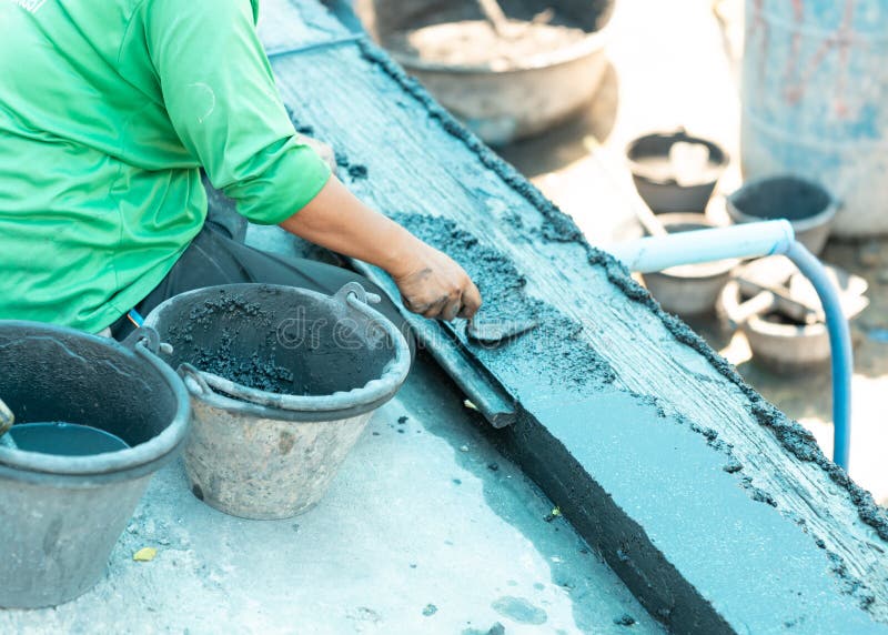 Worker Plastering Exposed Aggregate Finish on Foot Path Stock Image ...