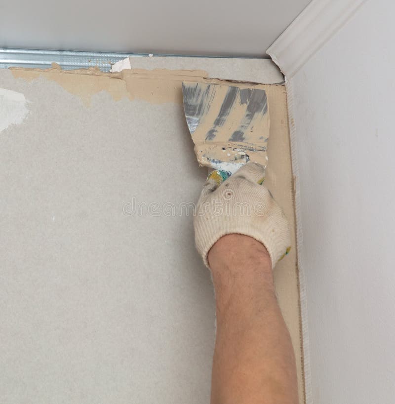 A Worker is Plastering a Wall with a Plastering Tool. Stock Image ...