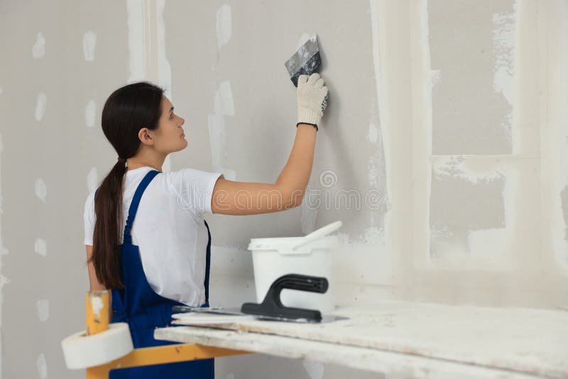 Worker Plastering Wall with Putty Knife Stock Image - Image of person ...