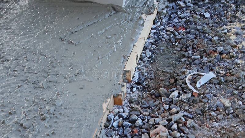 Worker Plastering Wet Concrete Cement Floor after Pouring Concreting ...