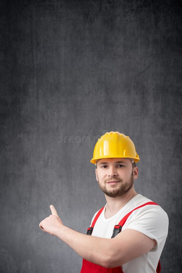 Worker Pointing His Finger at the Wall Stock Photo - Image of copy ...
