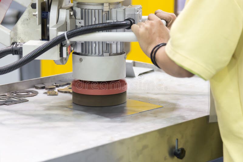 The Worker Polishing the Metal Plate Stock Photo - Image of metalwork ...