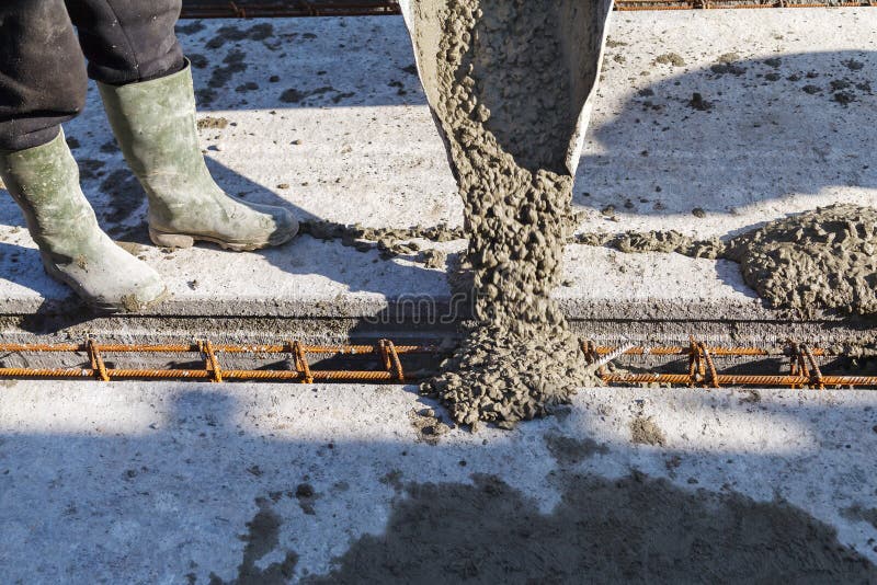 Worker Pouring Concrete Mix at Home Foundation Stock Image - Image of ...