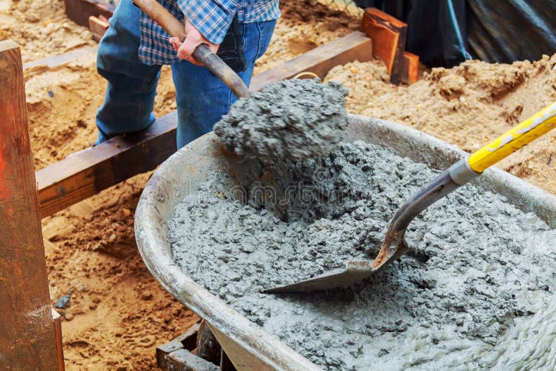 Worker Pouring Concrete To Formwork Construction Site Stock Image ...