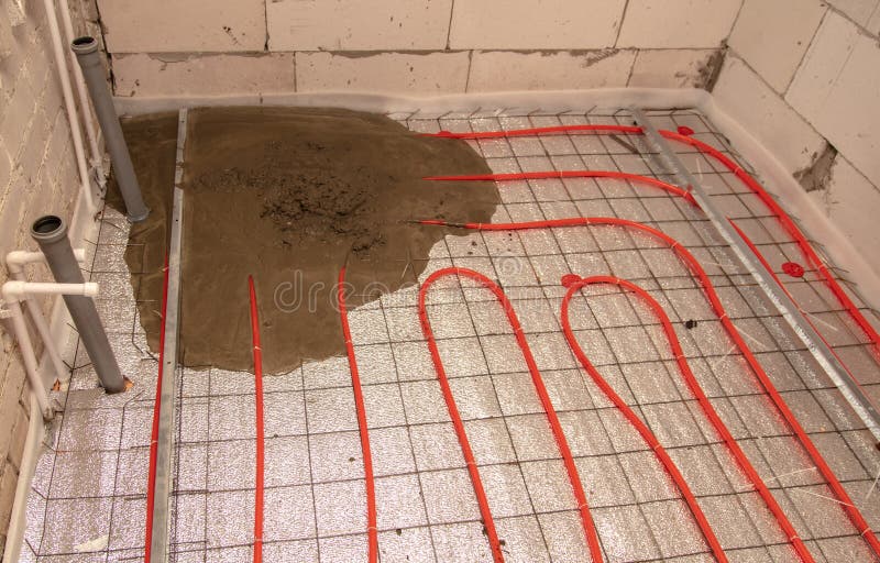 A Worker Pours Concrete Underfloor Heating in the Room Stock Image ... A Worker Pours Concrete Underfloor Heating in the Room Stock Image ...