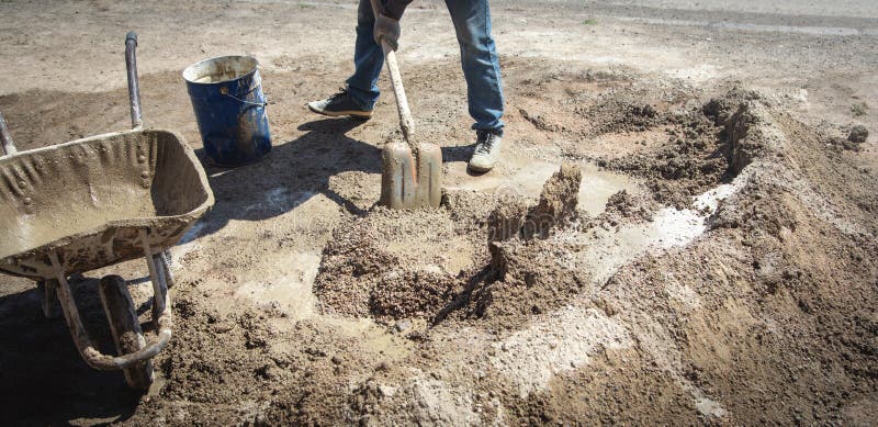 Worker Prepare Concrete with Shovel at Construction Site Stock Image ...