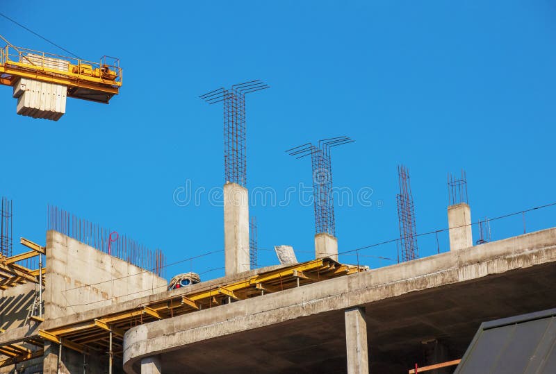 A Worker Prepares Formwork for a Modern Metal-concrete Structure of a ...