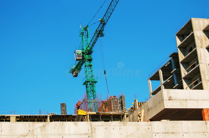 A Worker Prepares Formwork for a Modern Metal-concrete Structure of a ...