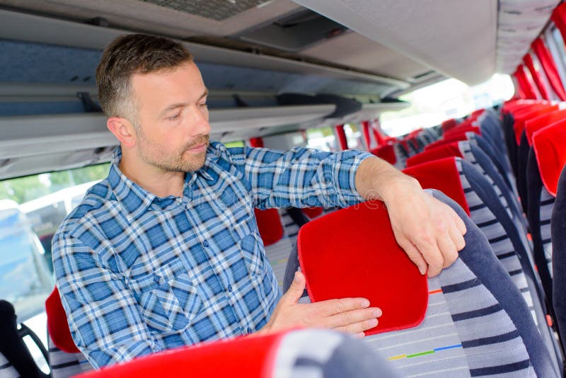 Worker preparing bus cabin stock image. Image of fare - 259959465