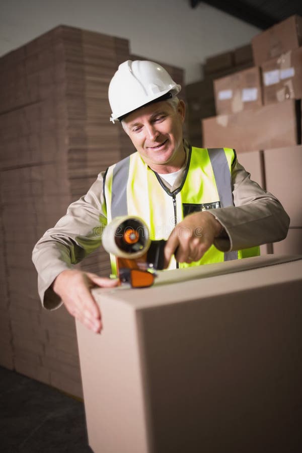 Worker Preparing Goods for Dispatch Stock Photo - Image of packing ...
