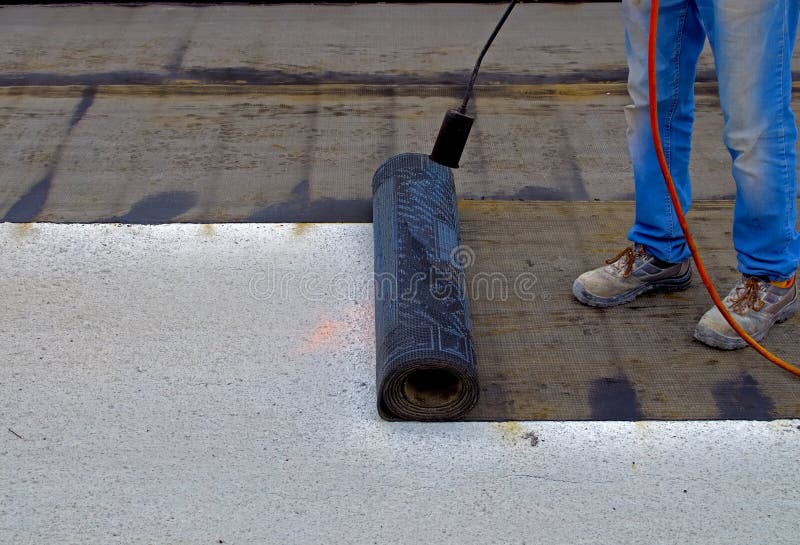 Worker Preparing Part of Bitumen Roofing Felt Roll Stock Image - Image ...