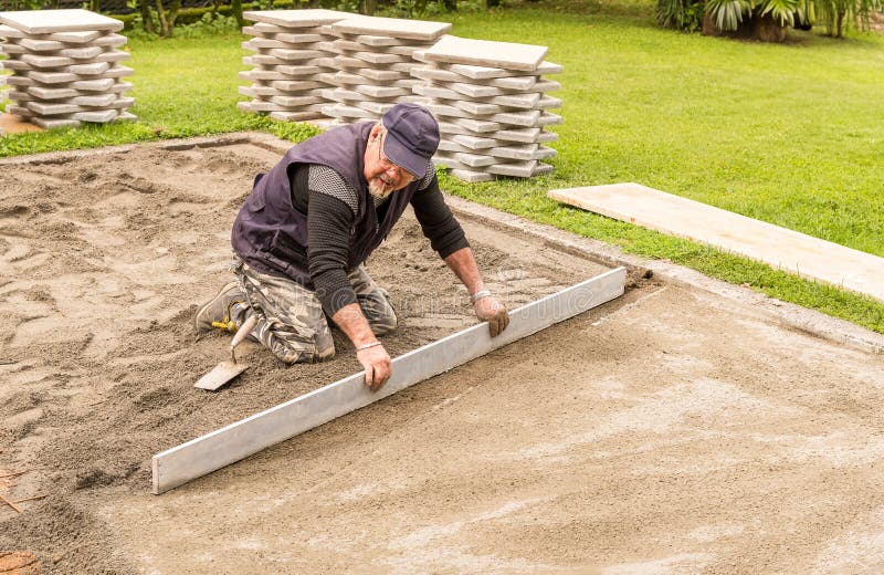 A Worker is Preparing the Sanding and Cement To Placing the Concrete ...
