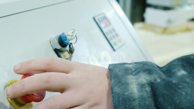 Worker Presses the Start Button on a Modern CNC Woodworking Machine ...