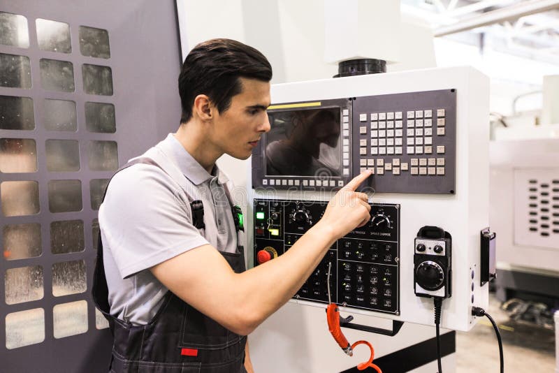 Worker Pressing Buttons on CNC Machine Stock Photo - Image of data ...
