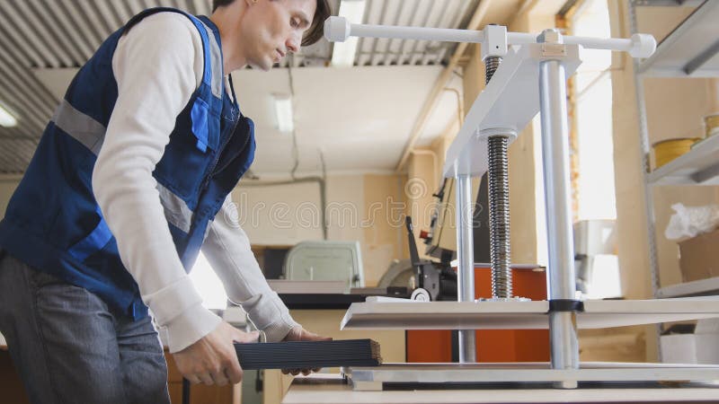 Worker in Printing House is Engaged in Printing Stock Photo - Image of ...
