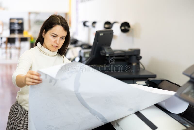 Worker in a Printing and Press Centar Check Print Quality Stock Image ...