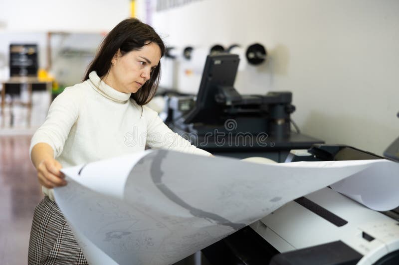Worker in a Printing and Press Centar Check Print Quality Stock Image ...