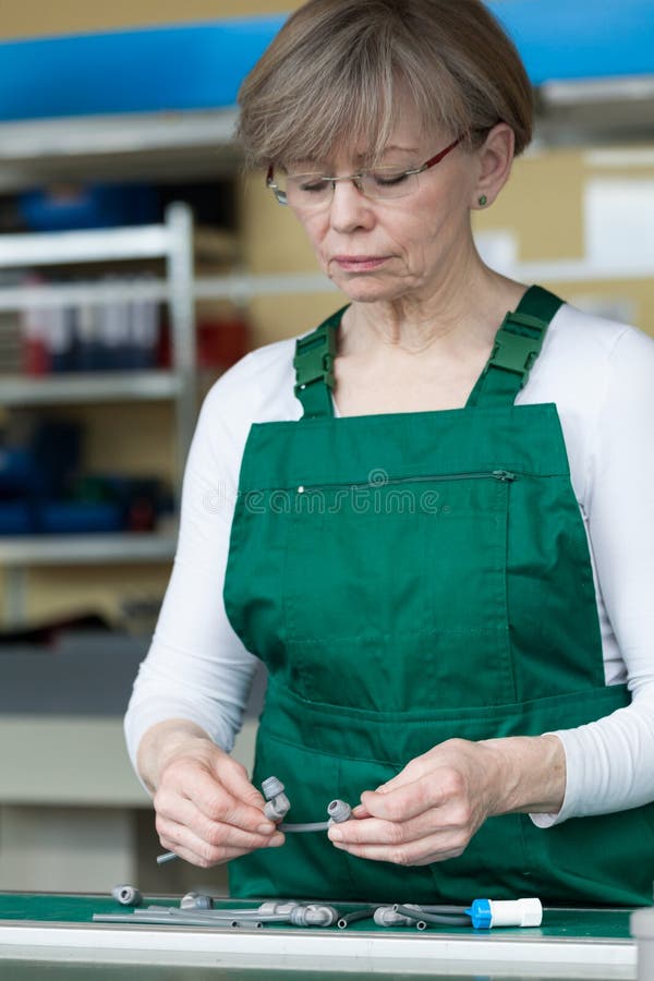 Female Assembly Line Workers Stock Photo - Image of female, indoor ...