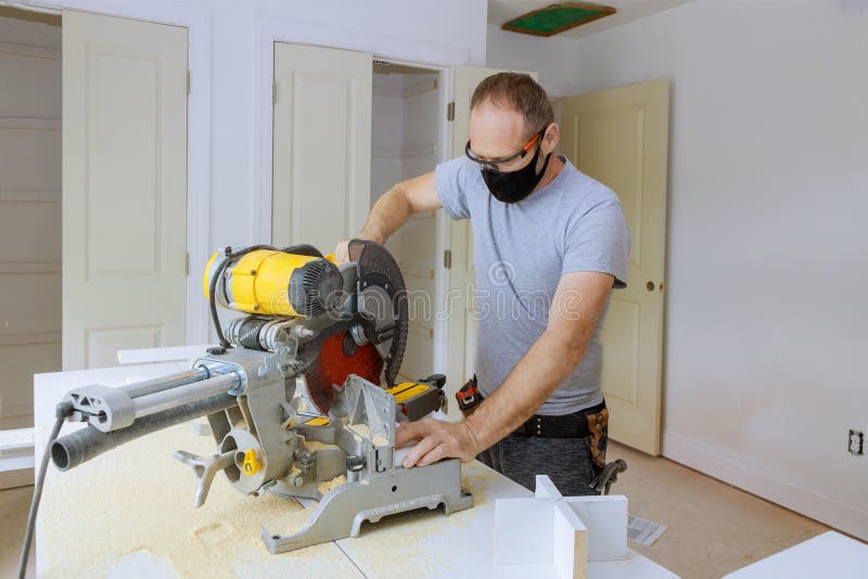 The Worker Protects Himself from Covid-19, Man Cut Using Circular Saw ... The Worker Protects Himself from Covid-19, Man Cut Using Circular Saw ...