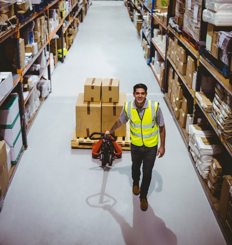 Worker Pulling Trolley with Boxes Stock Image - Image of caucasian ...