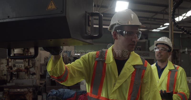 Worker in Factory stock footage. Video of facility, engineer - 325662656