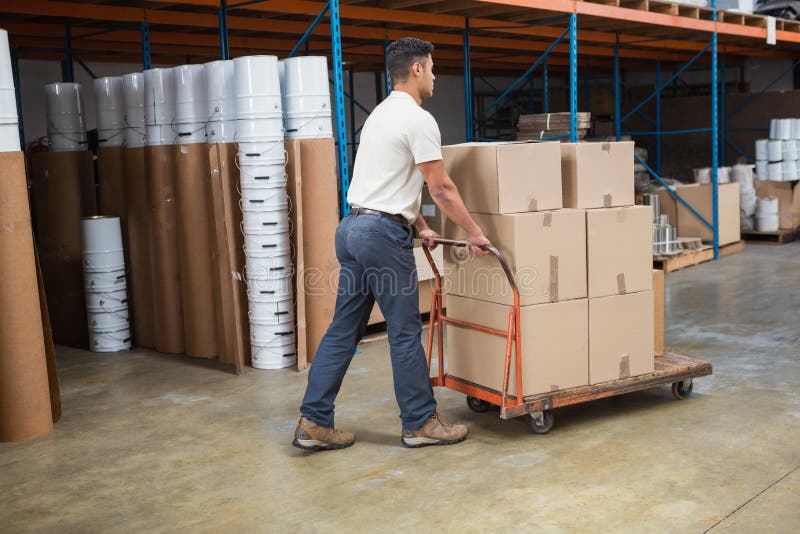 Worker Pushing Trolley with Boxes Stock Image - Image of supply ...