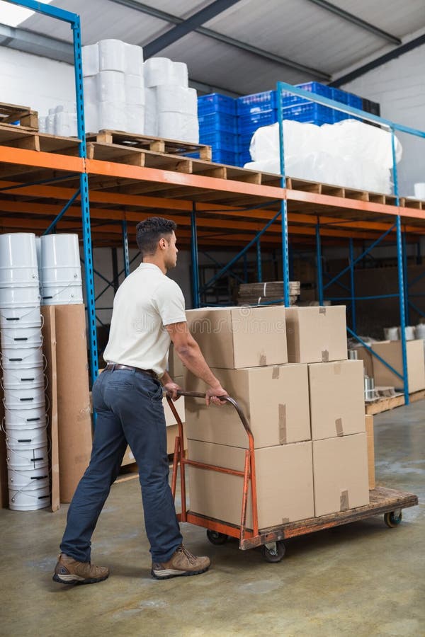 Worker Pushing Boss in Wheelbarrow Stock Photo - Image of construction ...