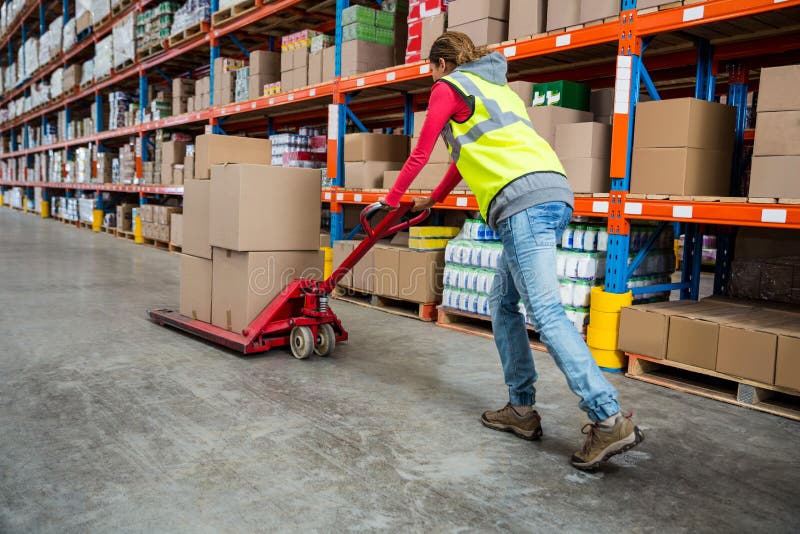 Worker Pushing Trolley with Boxes Stock Image - Image of commercial ...
