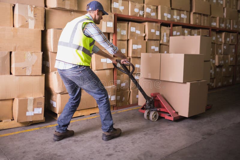 Worker Pushing Trolley with Boxes in Warehouse Stock Image - Image of ...