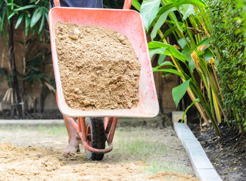 Worker are Pushing Wheelbarrow Stock Image - Image of worker, garden ...