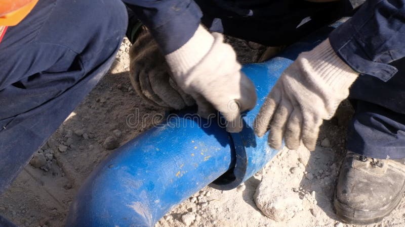 Worker Puts Cuff into Pipe for Pipeline Installation Stock Video ...