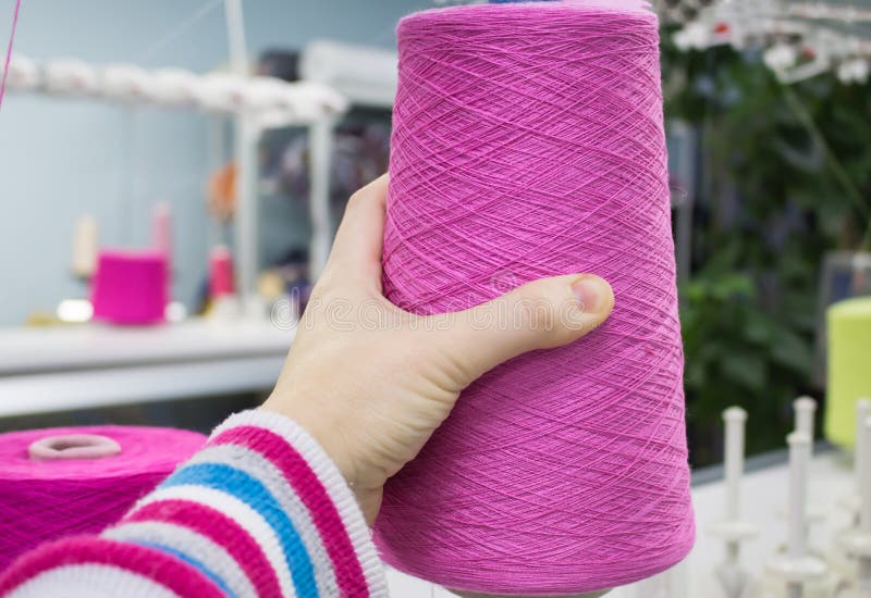 Worker Puts the Thread on the Knitting Machine Stock Photo - Image of ...