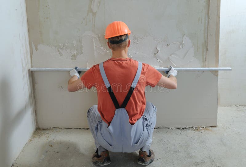 Worker is Putting a Gypsum Plaste. Stock Photo - Image of work, hands ...