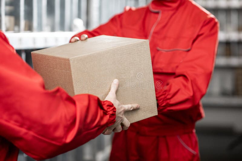 Warehouse Worker with Package Stock Photo - Image of merchandiser ...