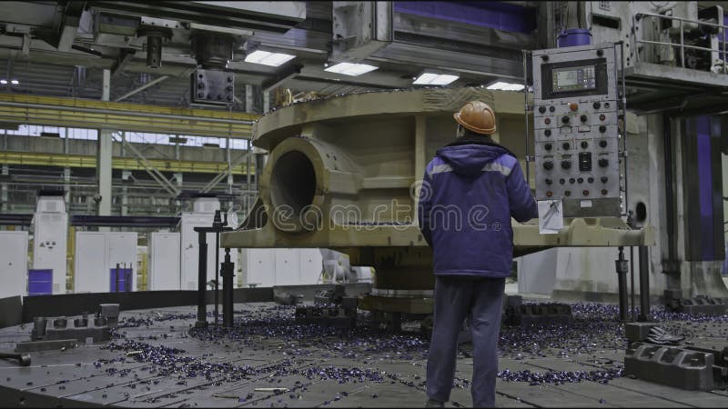 Worker with Remote Control and Rotating Lathe. Stock Clip Stock Image ...