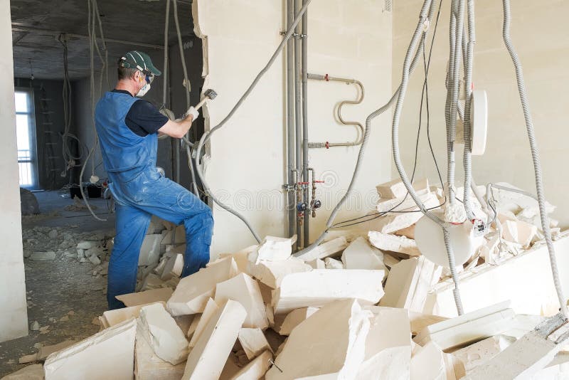 Worker Removes Debris from the Destroyed Wall Stock Image - Image of ...
