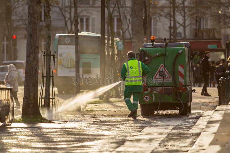 Worker removing garbage editorial stock photo. Image of clearing ...