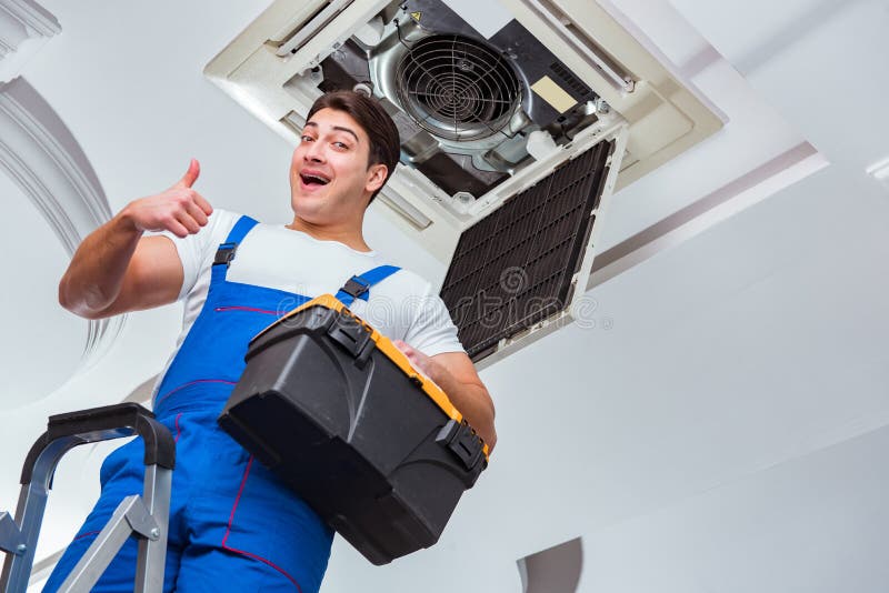 The Worker Repairing Ceiling Air Conditioning Unit Stock Image - Image ...