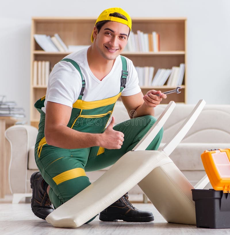 Worker Repairing Furniture at Home Stock Image - Image of furniture ...