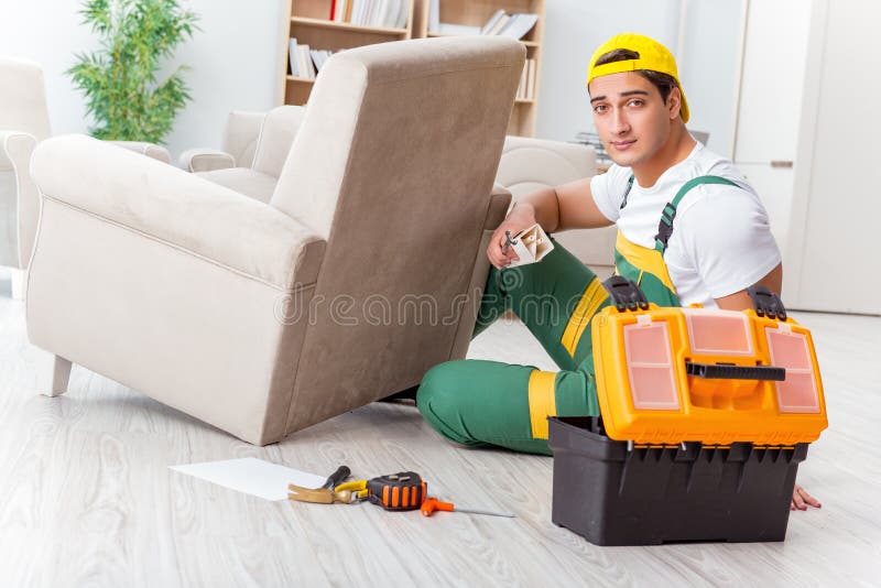 The Worker Repairing Furniture at Home Stock Photo - Image of house ...