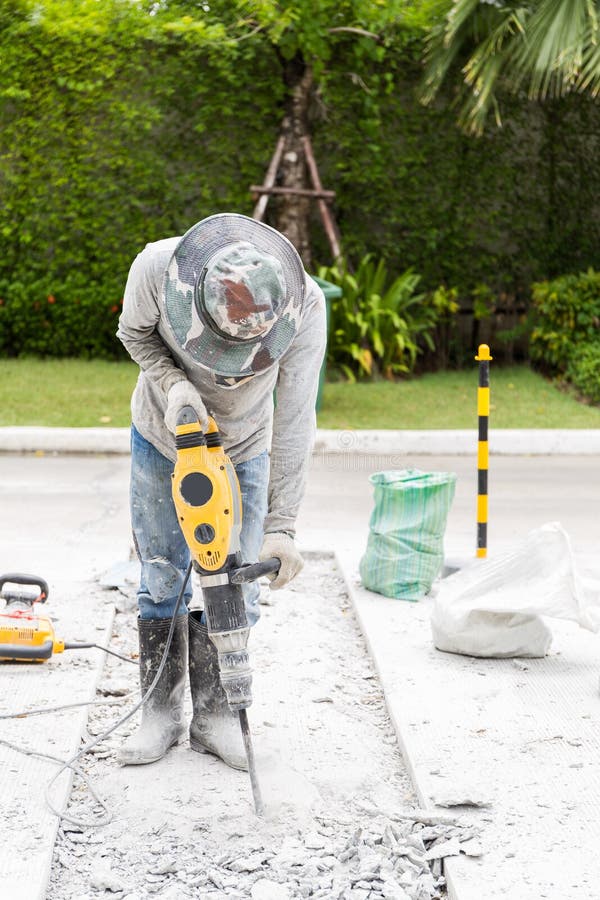 Worker Repairing Road / Worker Drilling Road Stock Photo - Image of ...