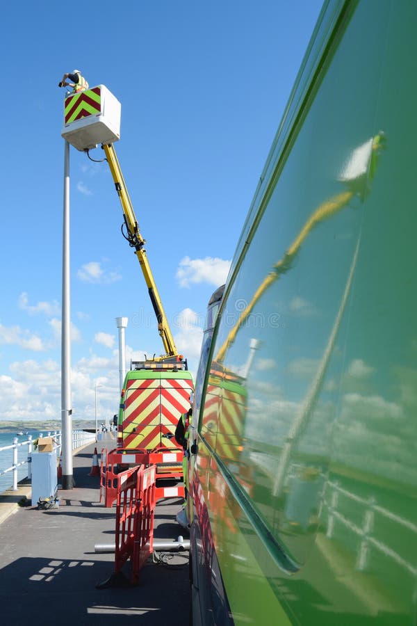 Worker Repairing Street Light Stock Image - Image of equipment ...