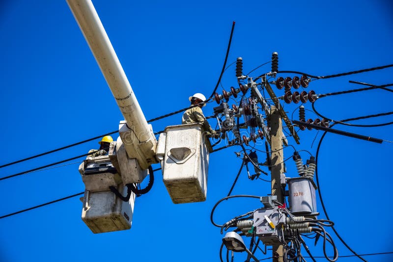 Worker Repairing Work on Electric Post Power Pole Stock Image - Image ...