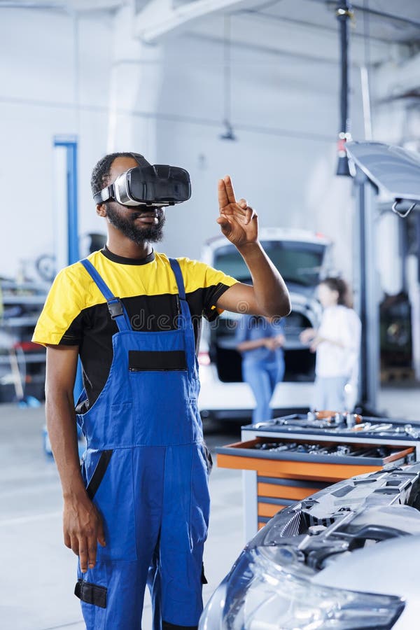 Worker Repairs Car Using VR Technology Stock Image - Image of bipoc ...